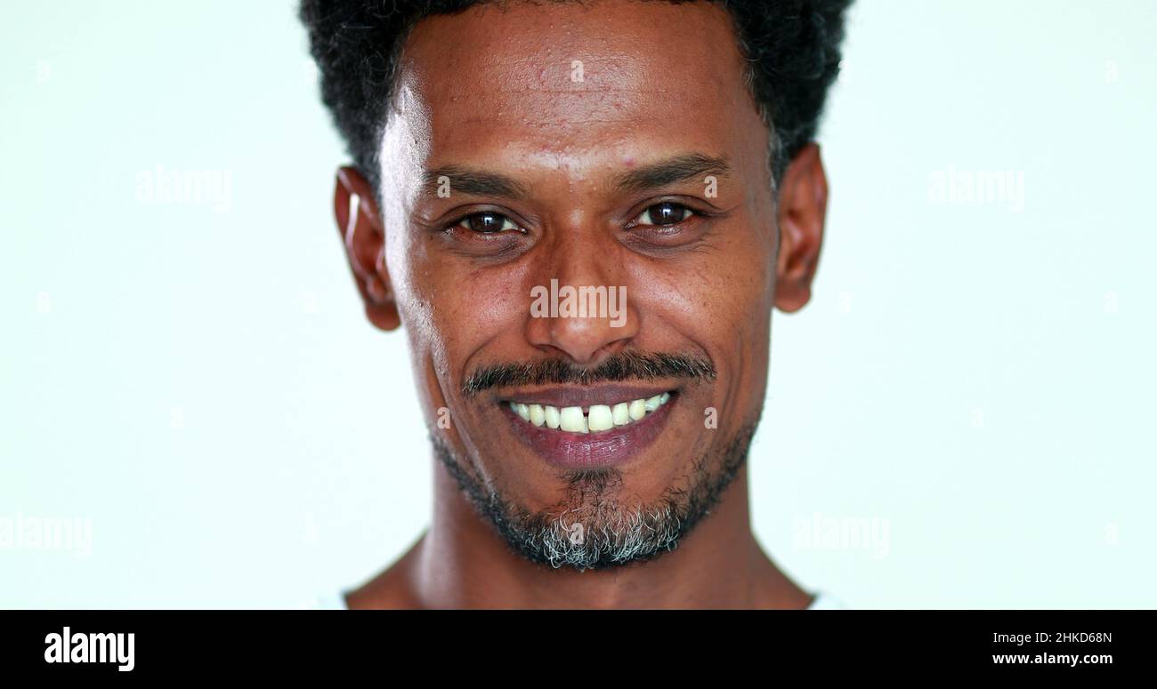 African person smiling to camera close-up face expression. friendly ...