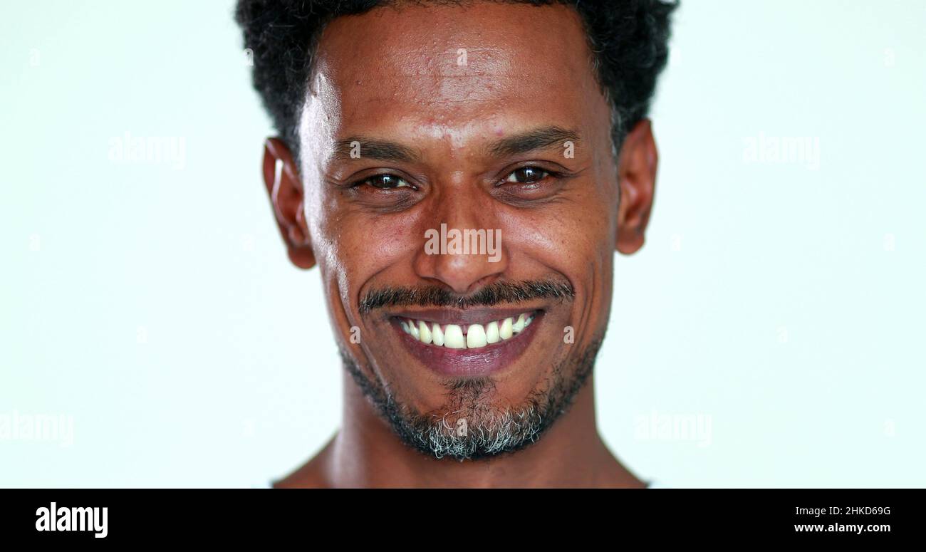 African person smiling to camera close-up face expression. friendly ...