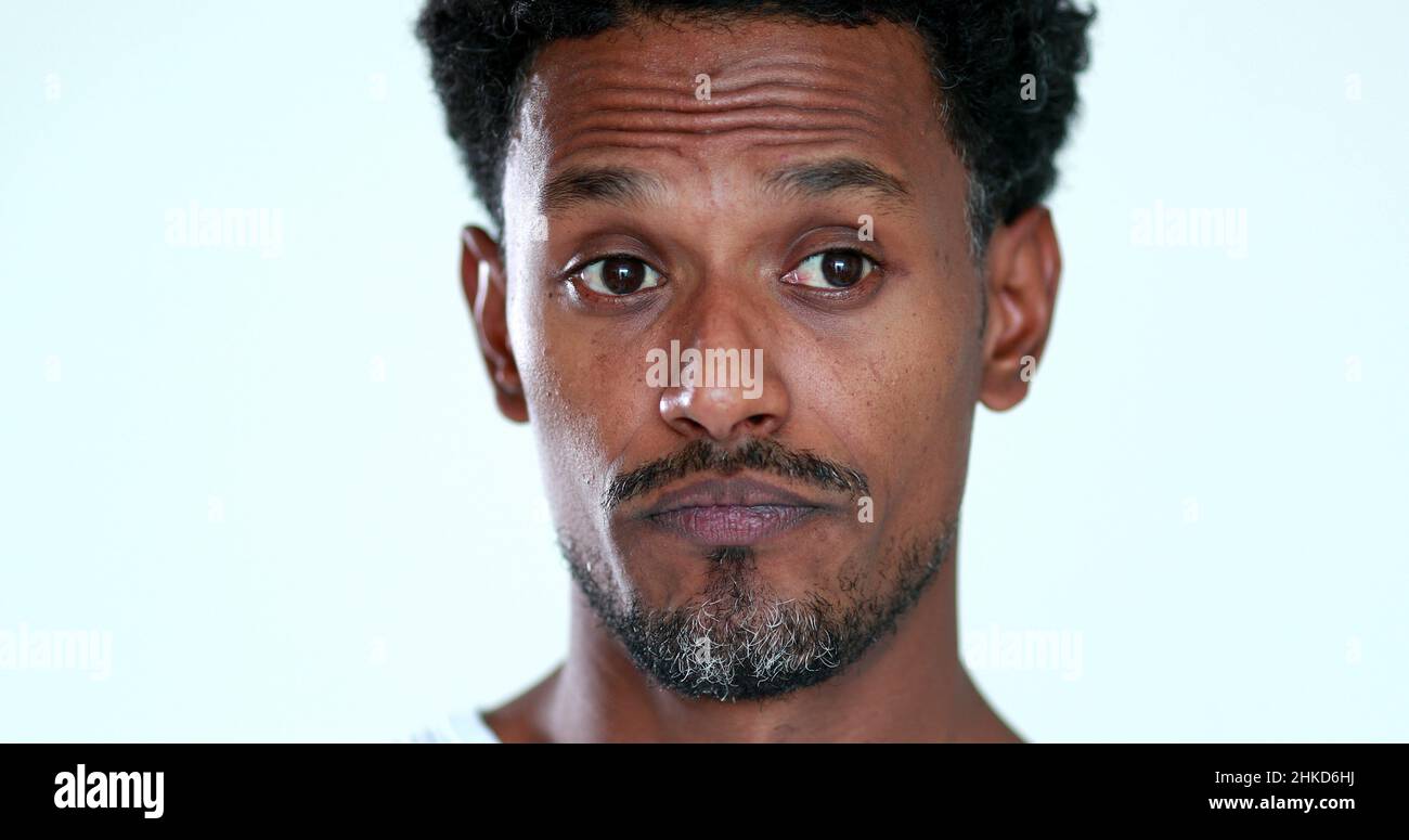 Clueless person thinking portrait face. Doubtful pensive african ...
