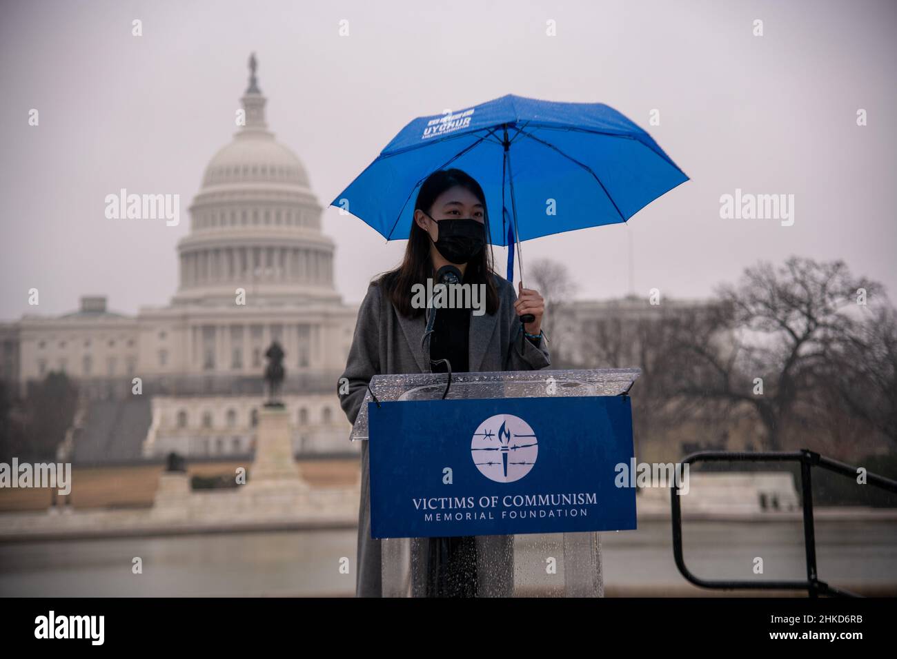 Joey Siu, Policy Advisor at Hong Kong Watch, speaks to protesters ...