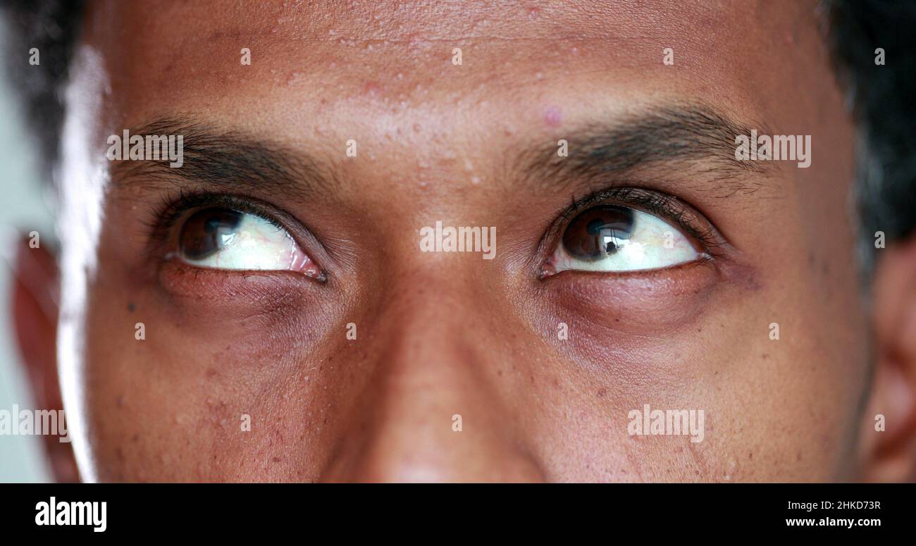 Pensive african american descent close-up eyes macro. Thoughtful ...