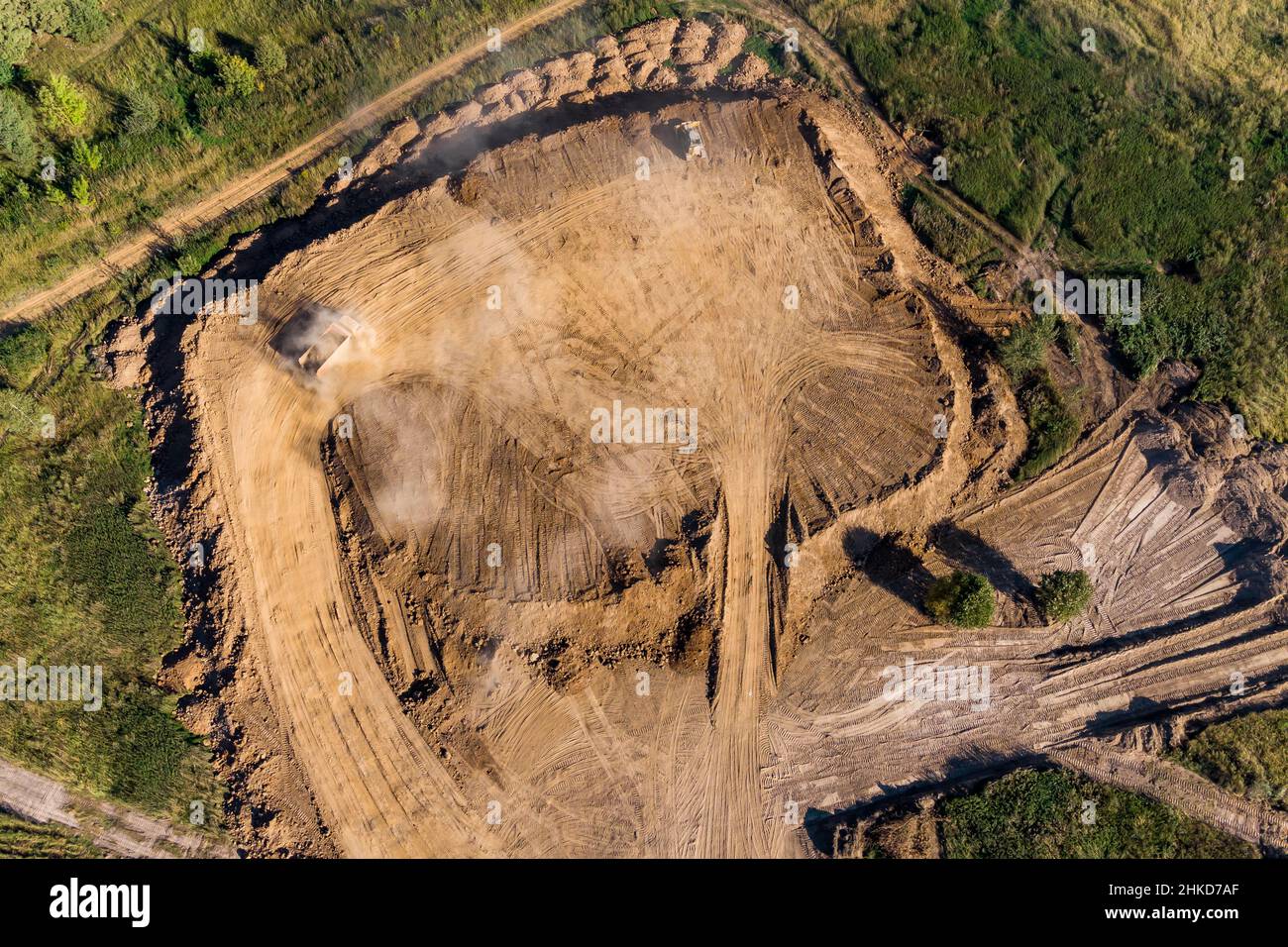 Removal of overburden on a piece of land before sand pit mining, aerial ...