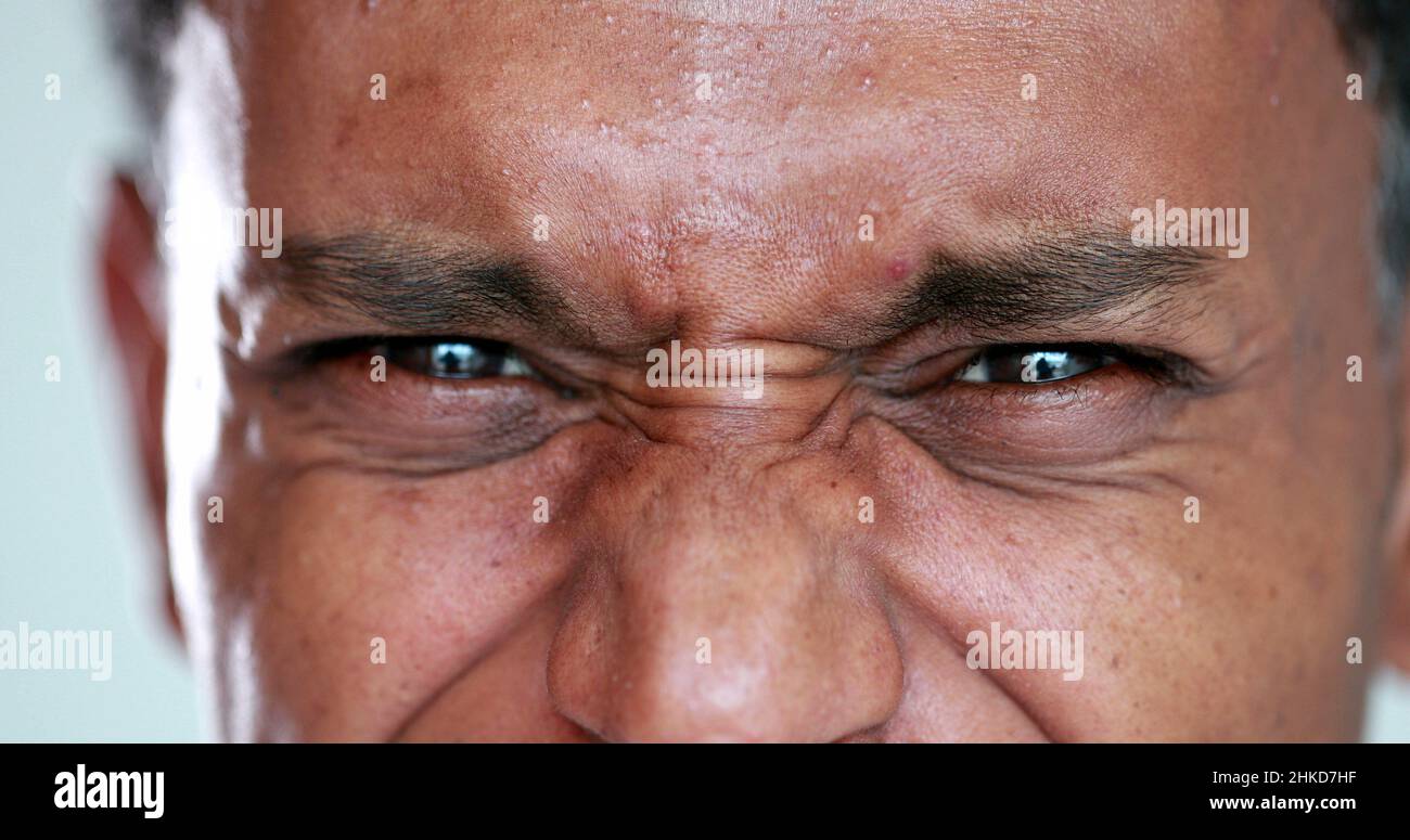 Person feeling disgust emotion, African man grimacing in distaste ...