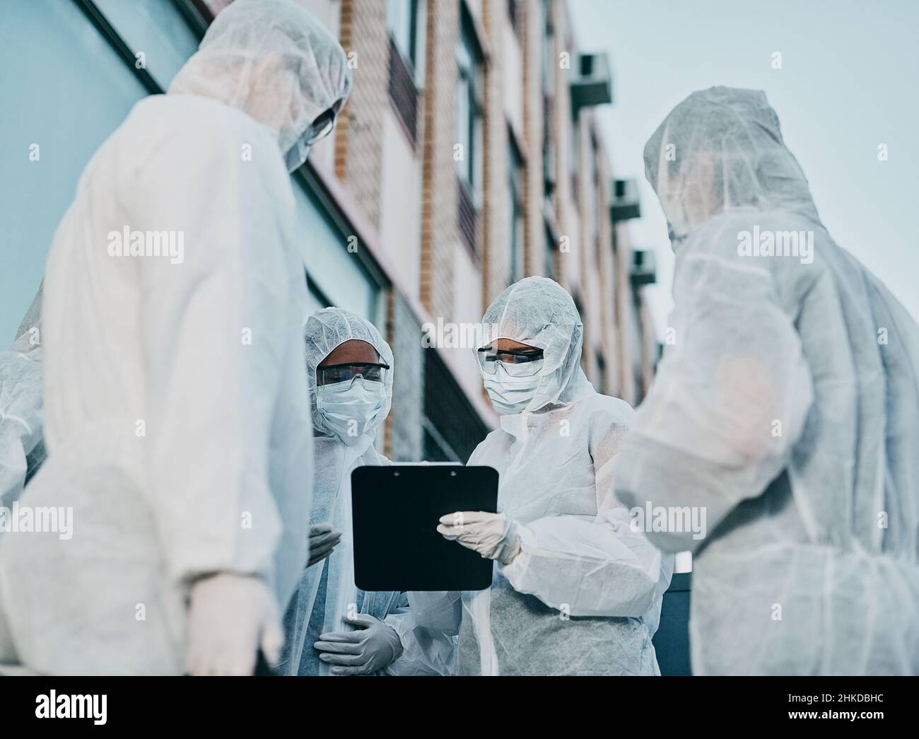 Teamwork makes infection control work. Shot of a group of healthcare ...