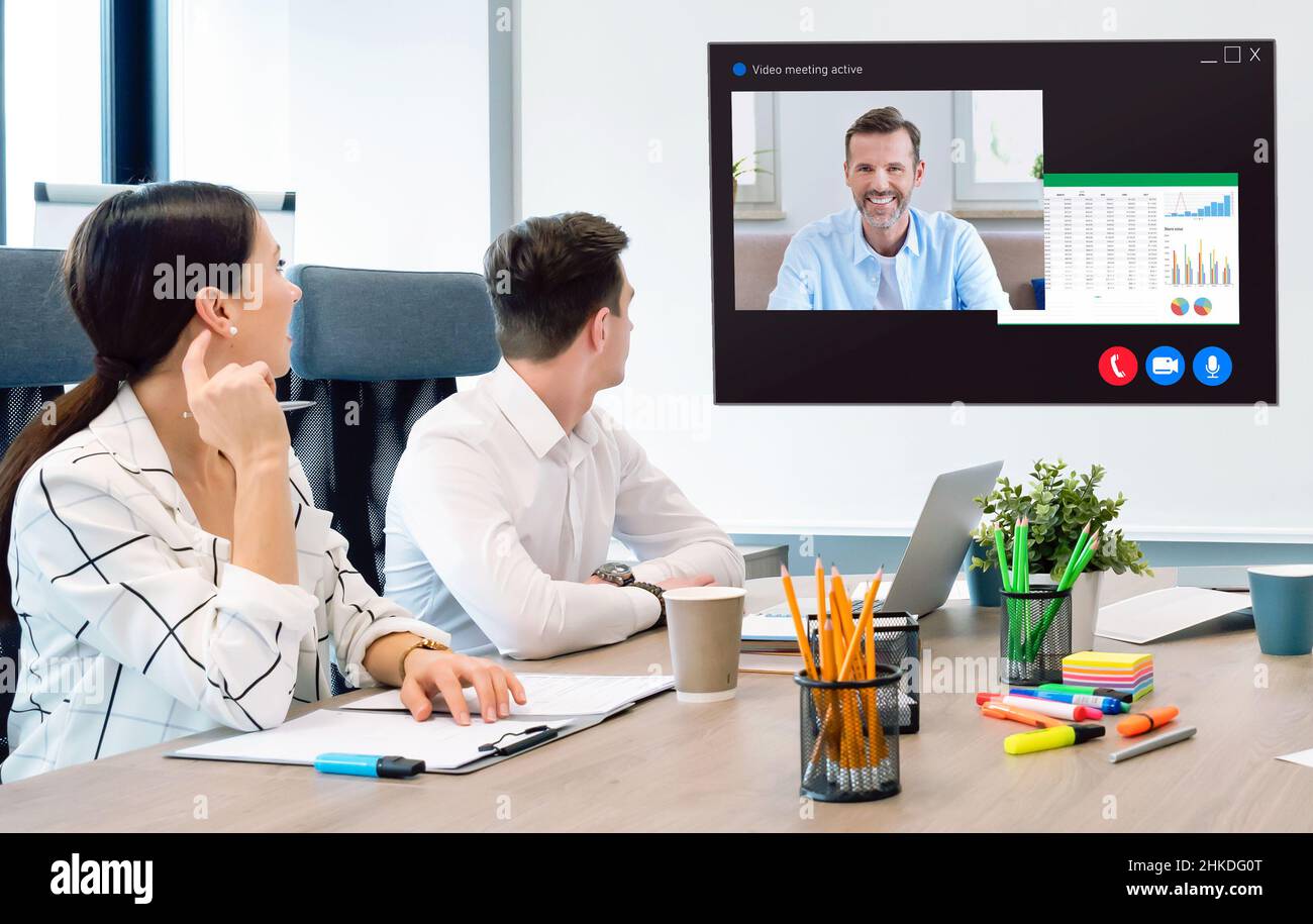 Business meeting in the conference room. Remote connection, web ...