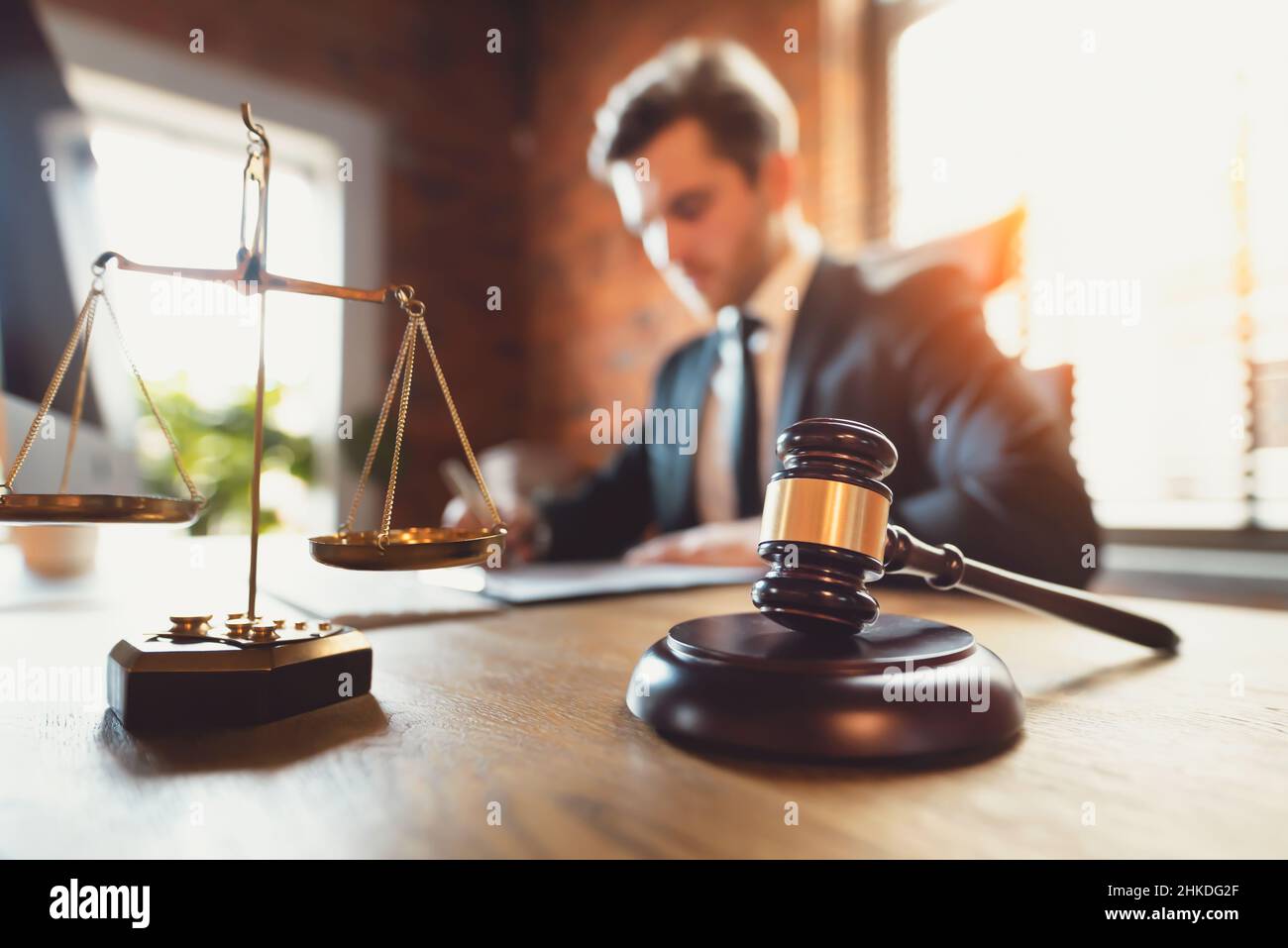 Attorney, clerk, bookkeeper working in the office. Signing contract or ...