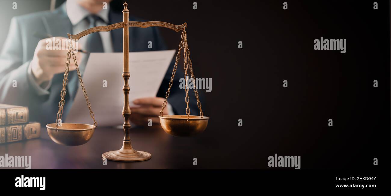 Lawyer working in the office. Law concept with weight scale Stock Photo ...