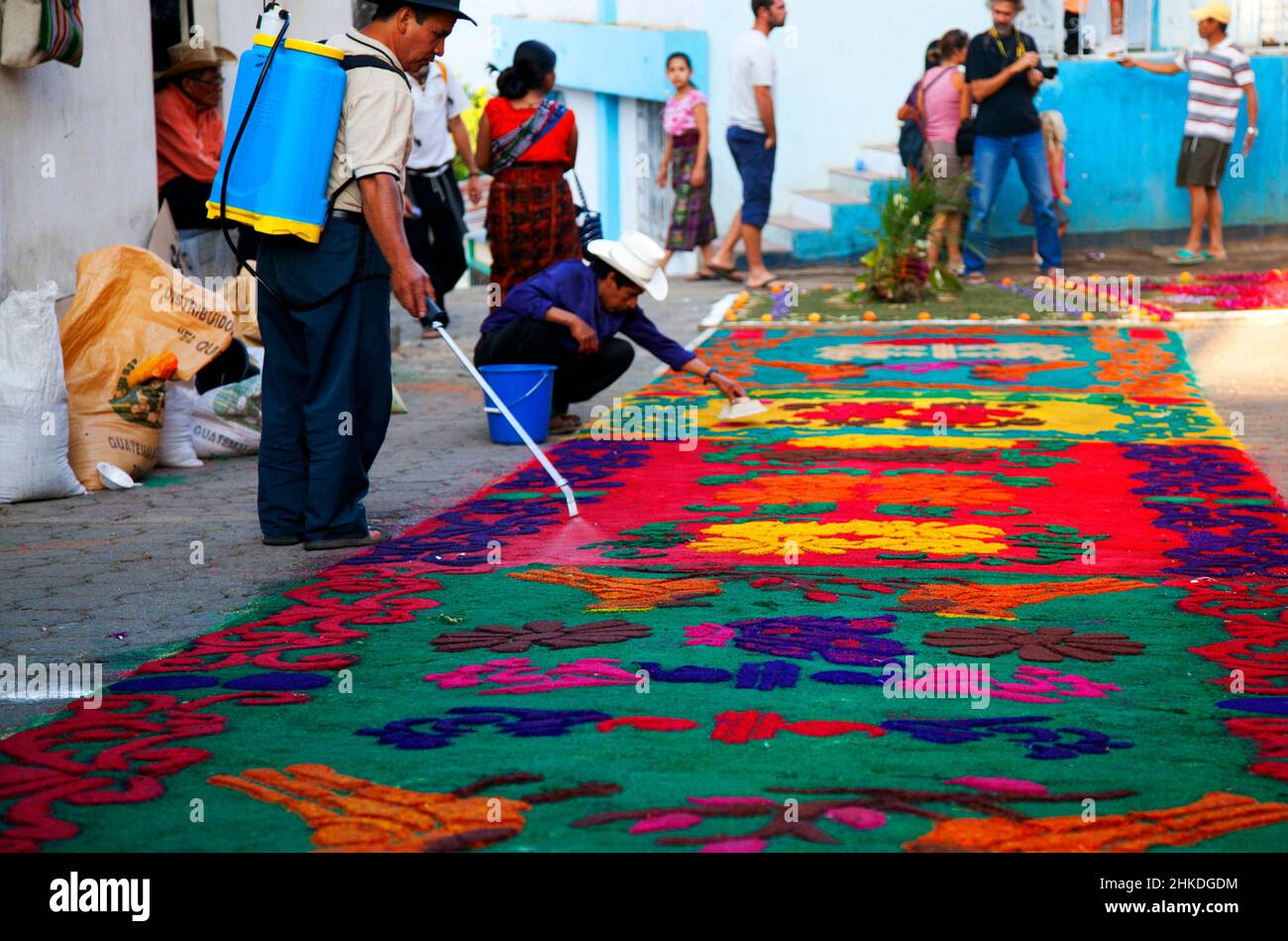 Street screen of locals producing alfombra, sawdust carpets with ...