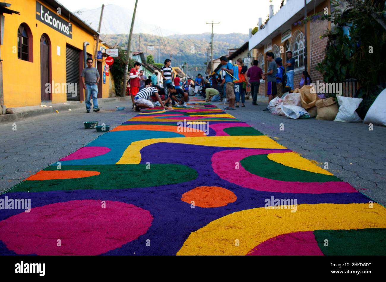 Street screen of locals producing alfombra, sawdust carpets with ...