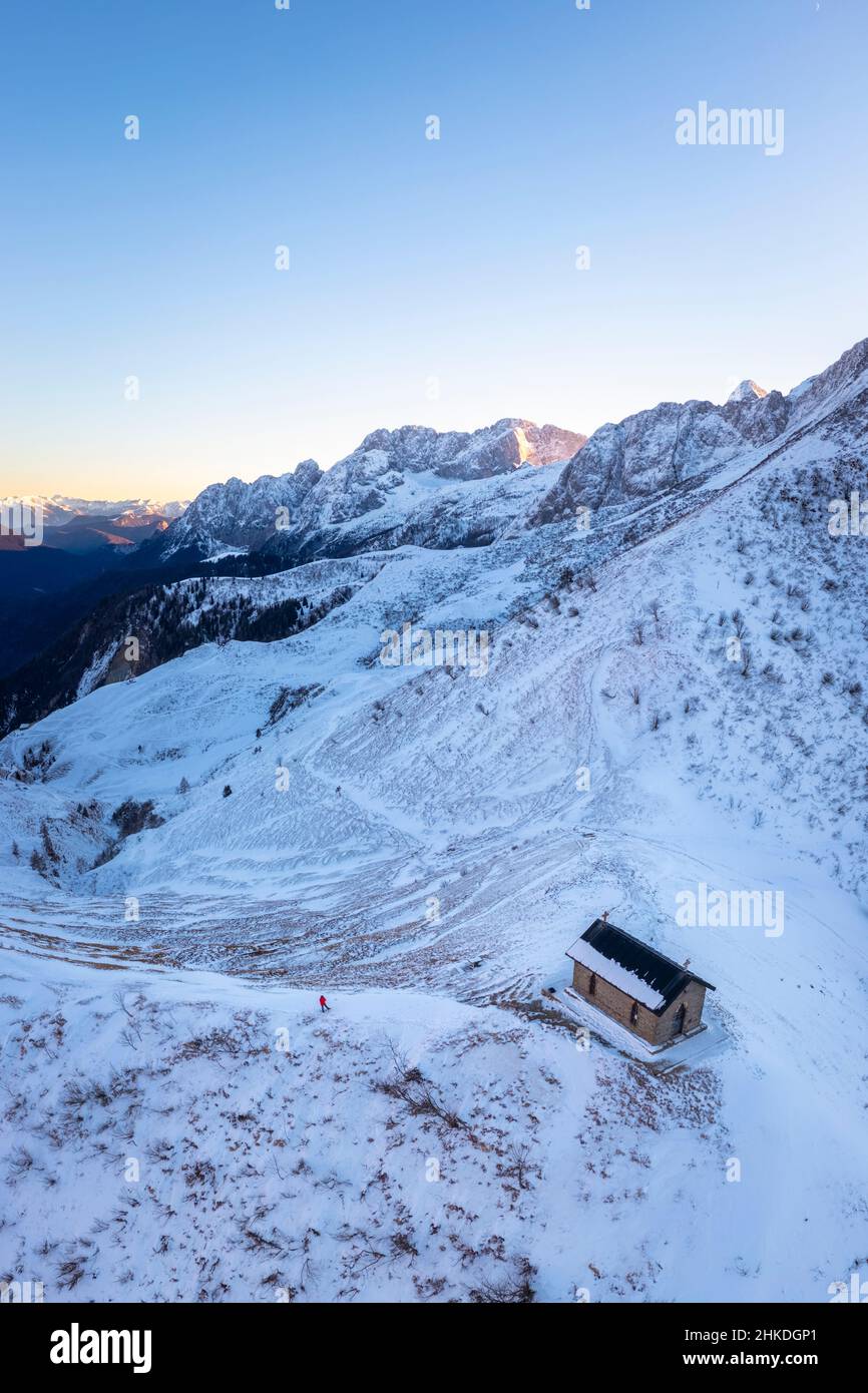Aerial view of the small church at the top of the Manina Pass in winter ...