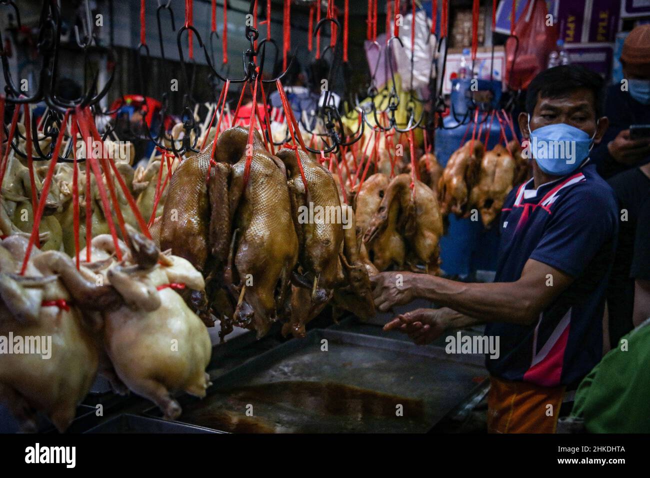 A vendor selling Soya ducks for the Chinese New Year ceremonies in ...
