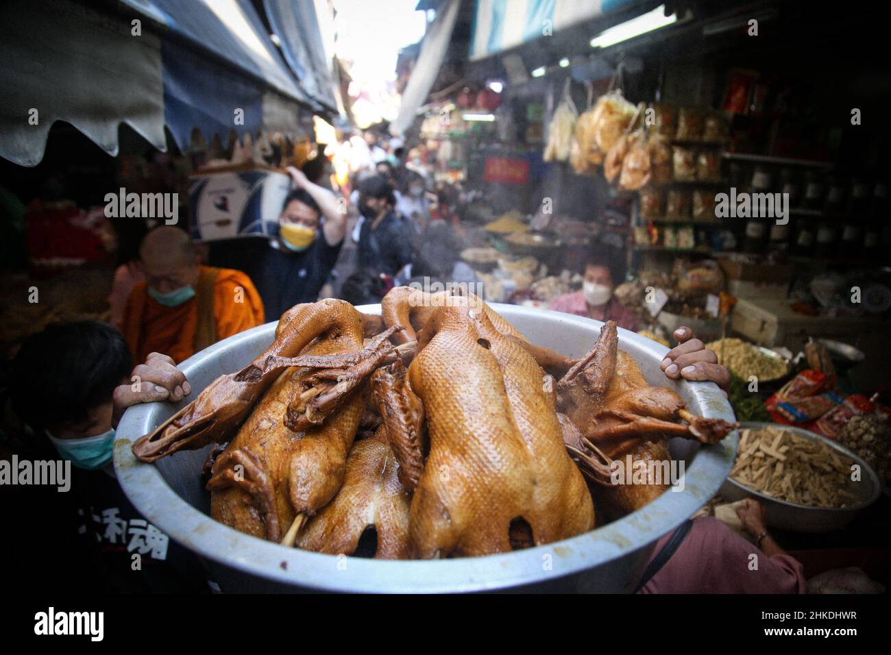A hawker selling soya ducks during the Chinese New Year in China Town ...