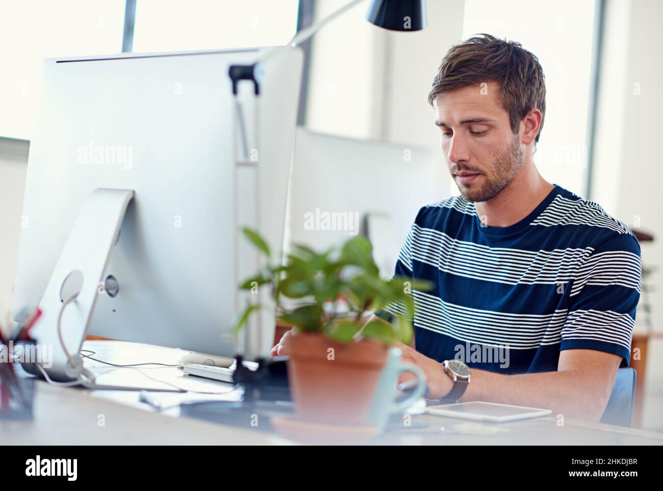 Hard at work on the new design Stock Photo - Alamy
