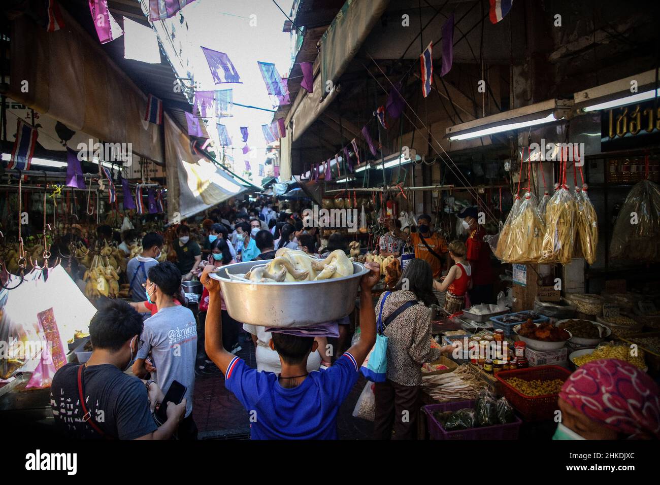 Bangkok, Thailand. 30th Jan, 2022. A hawker selling soya ducks during ...