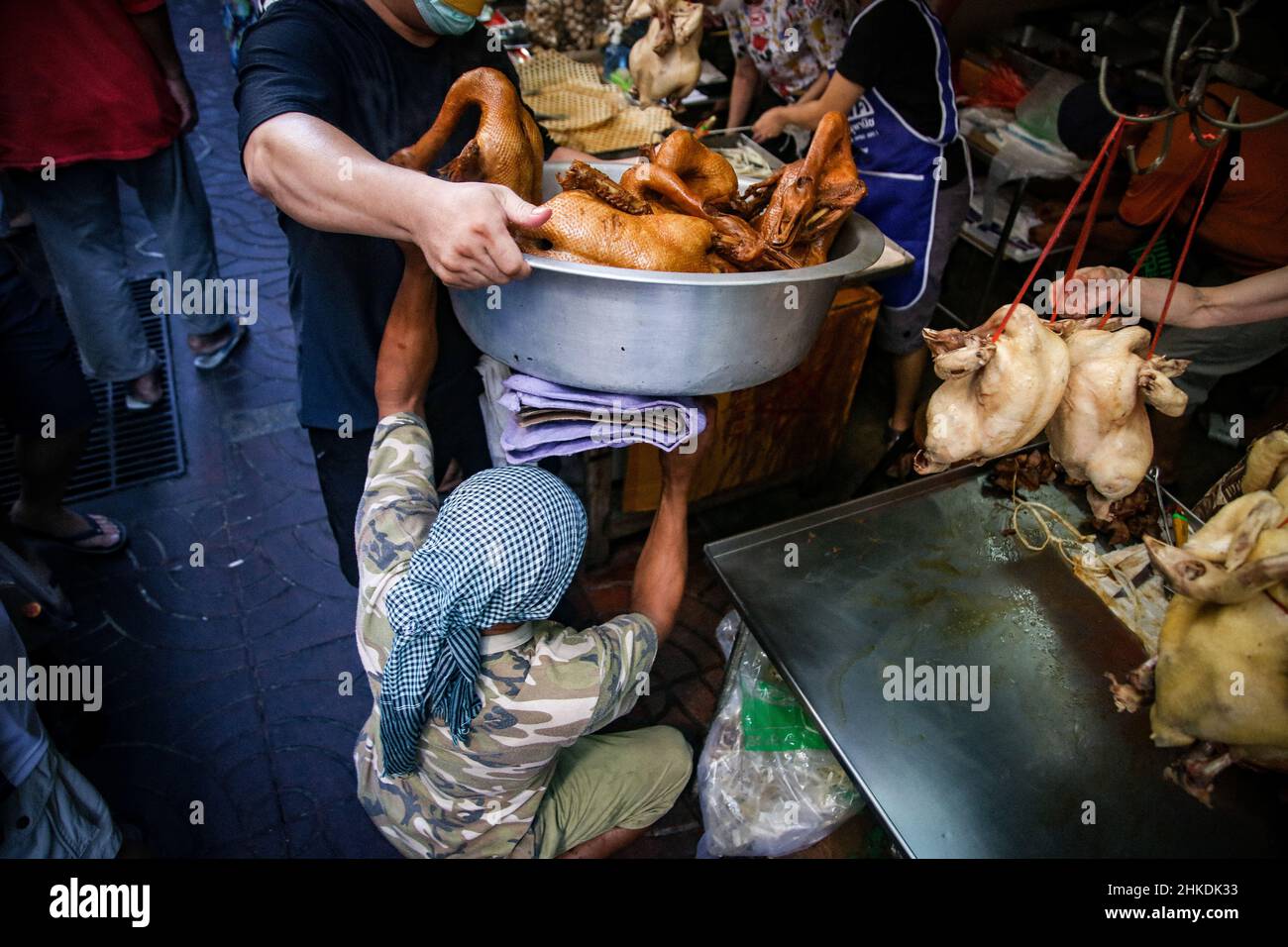 Bangkok, Thailand. 30th Jan, 2022. A hawker selling soya ducks during ...