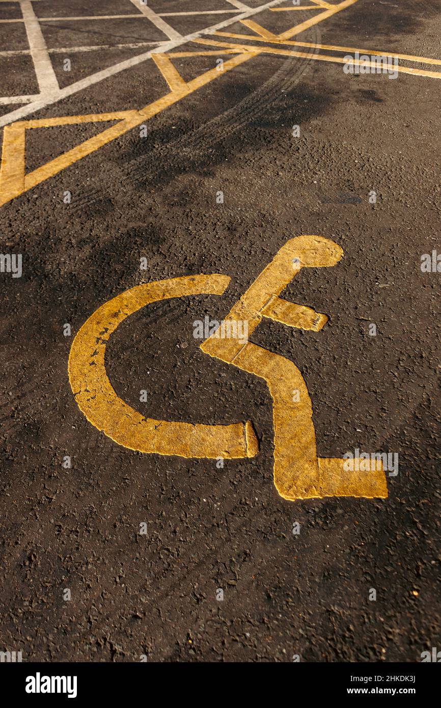 Disabled parking. Accessible parking spot. Blue badge. Yellow ...