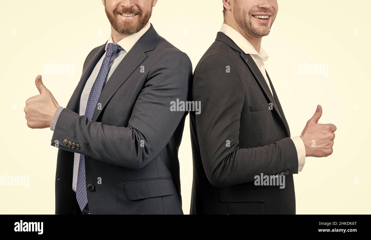 two cropped men back to back. businessmen in suit. boss and employee ...