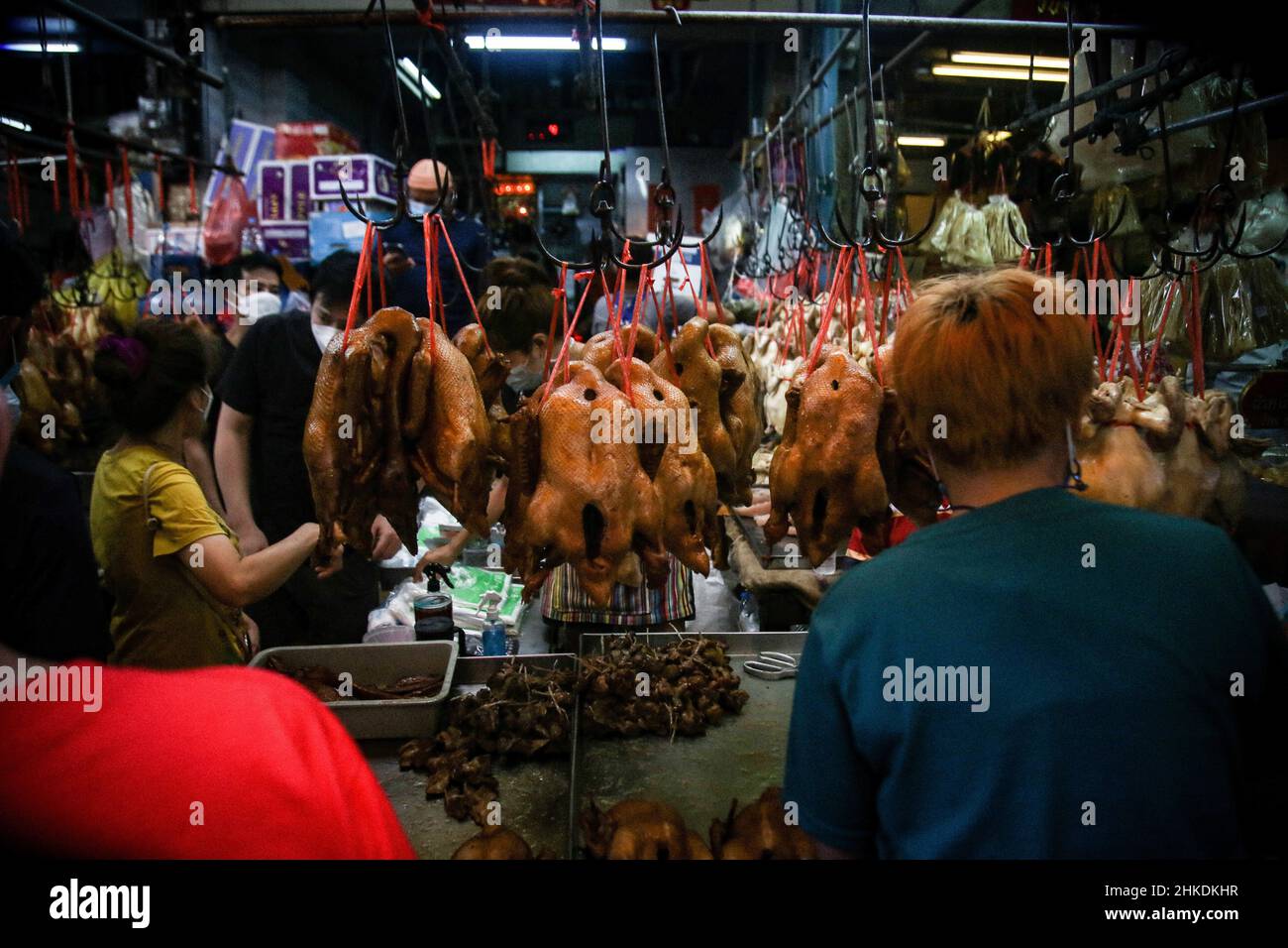 Bangkok, Thailand. 30th Jan, 2022. People buying deep fried Soya ducks ...