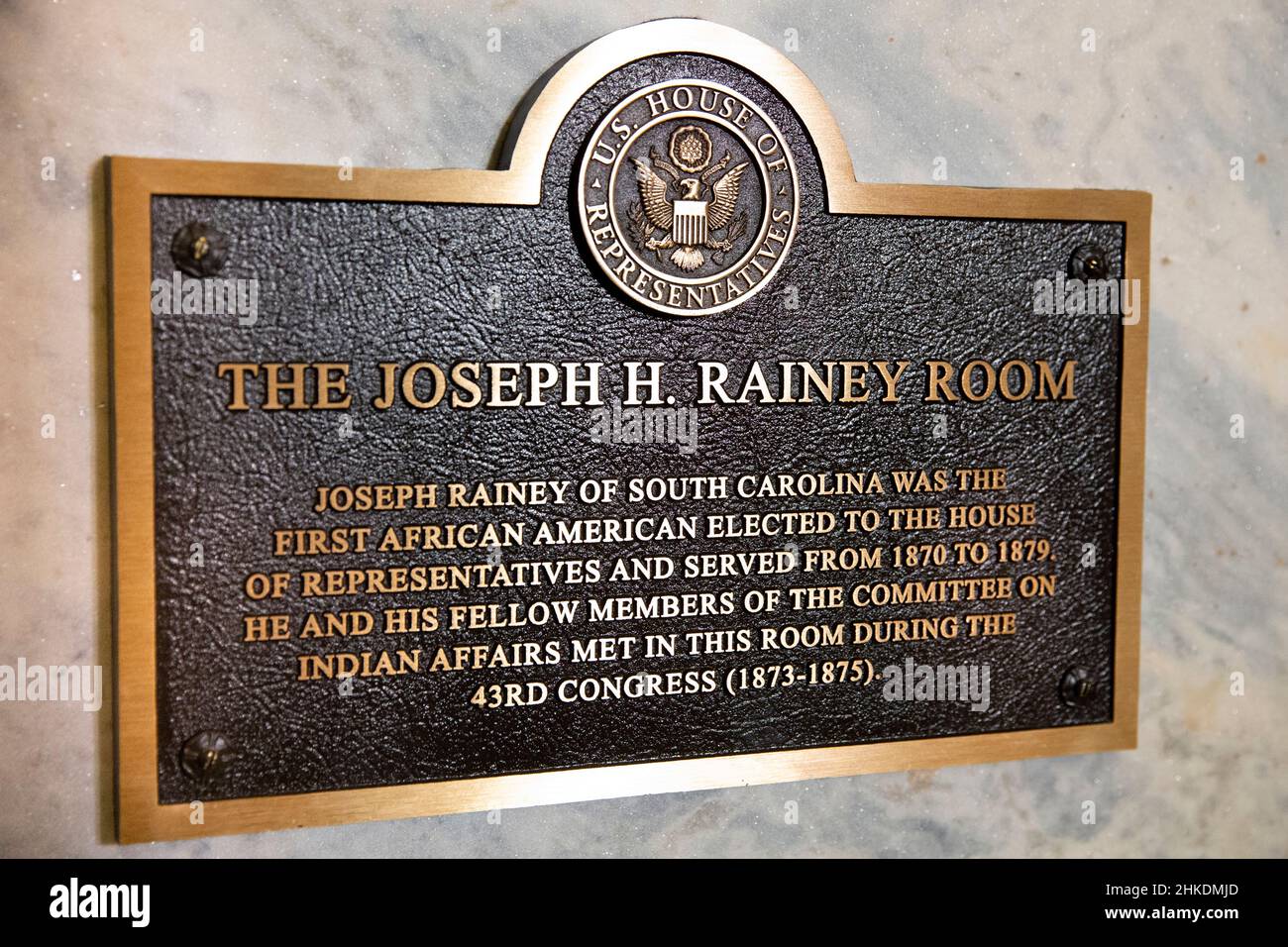 A newly-unveiled plaque is seen at an unveiling ceremony for the Joseph ...