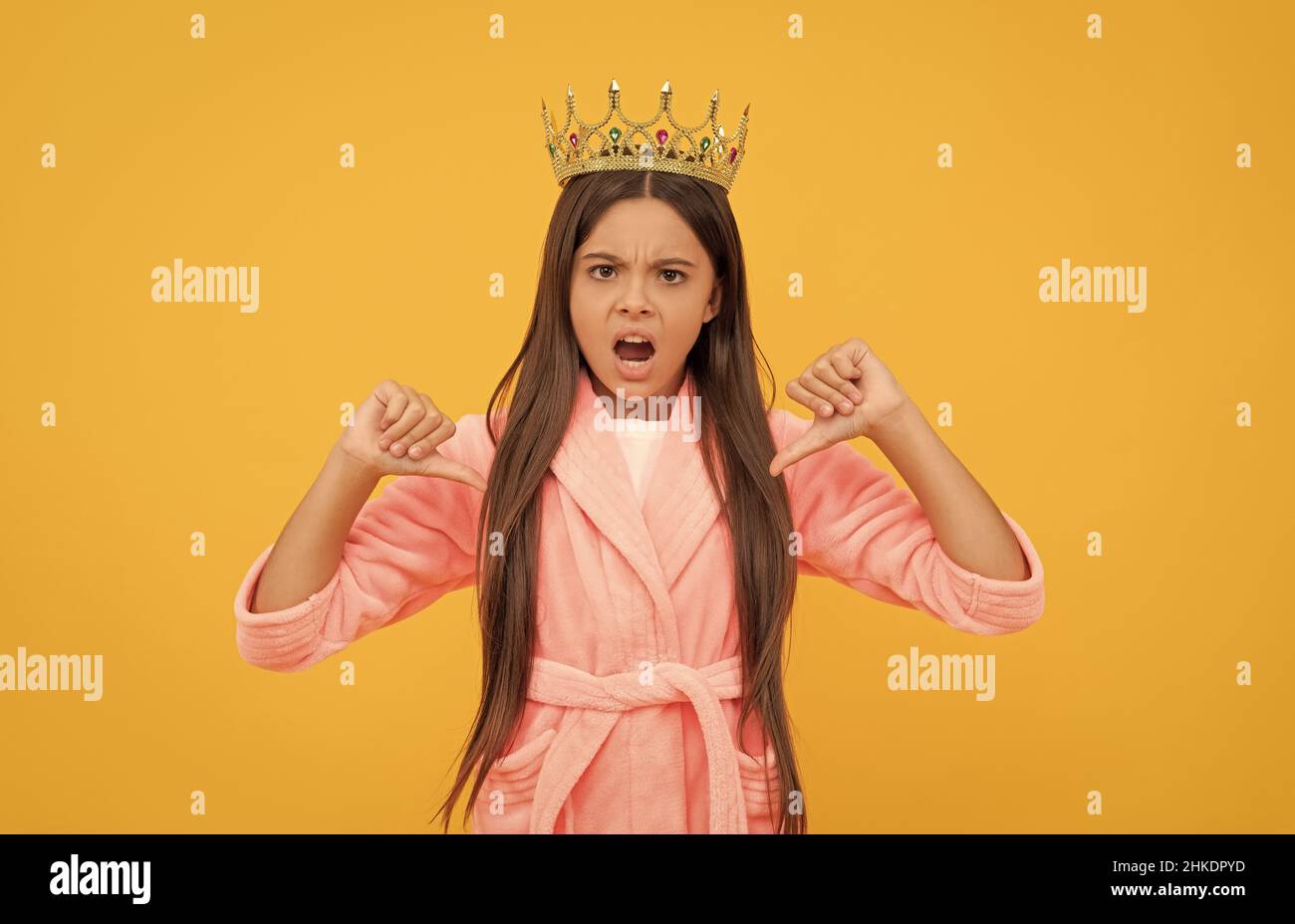 egocentric teen girl in crown pointing finger on herself. good morning ...