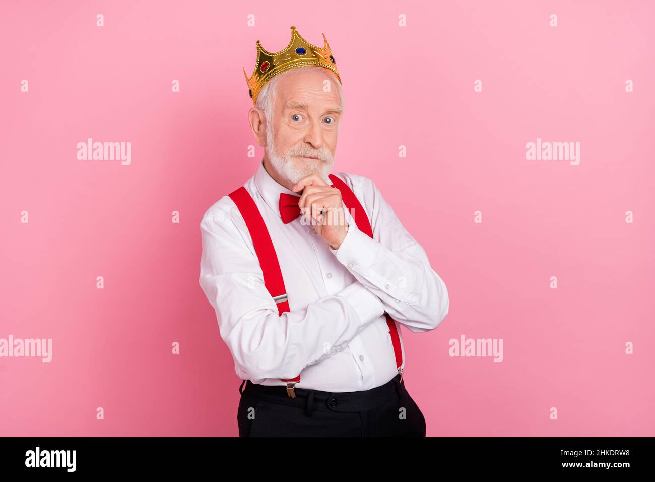 Portrait of attractive minded gray-haired man wearing tiara deciding ...