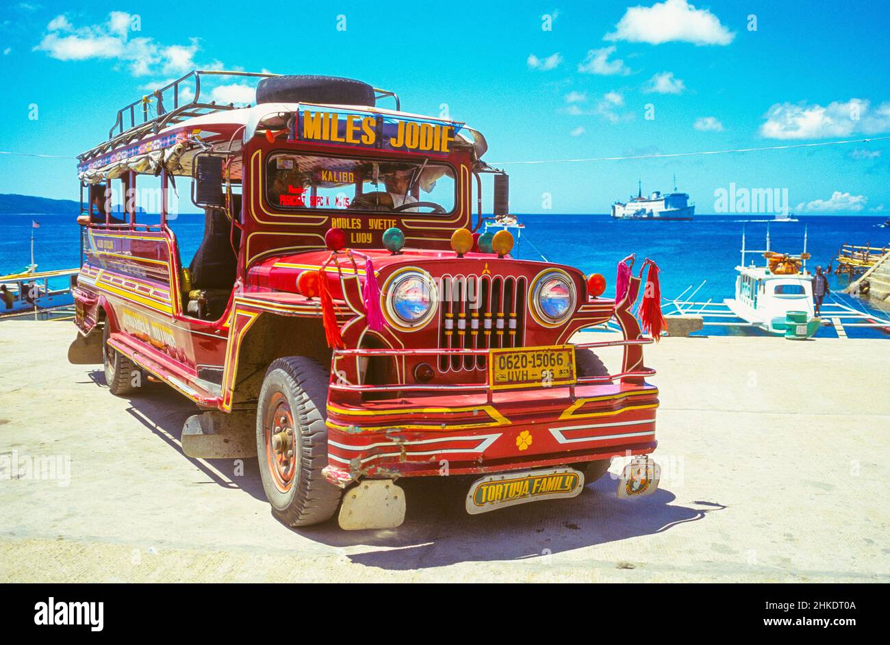 A jeepney van on the main ferry wharf for arrivals to Boracay Island in ...