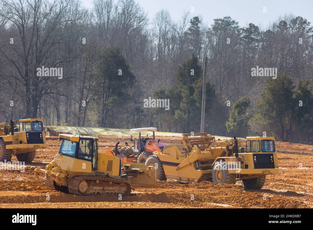 Preparation of the land for the construction site with wheel loader ...