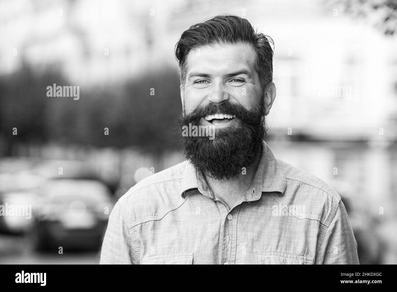 Positive happy handsome bearded man Black and White Stock Photos ...
