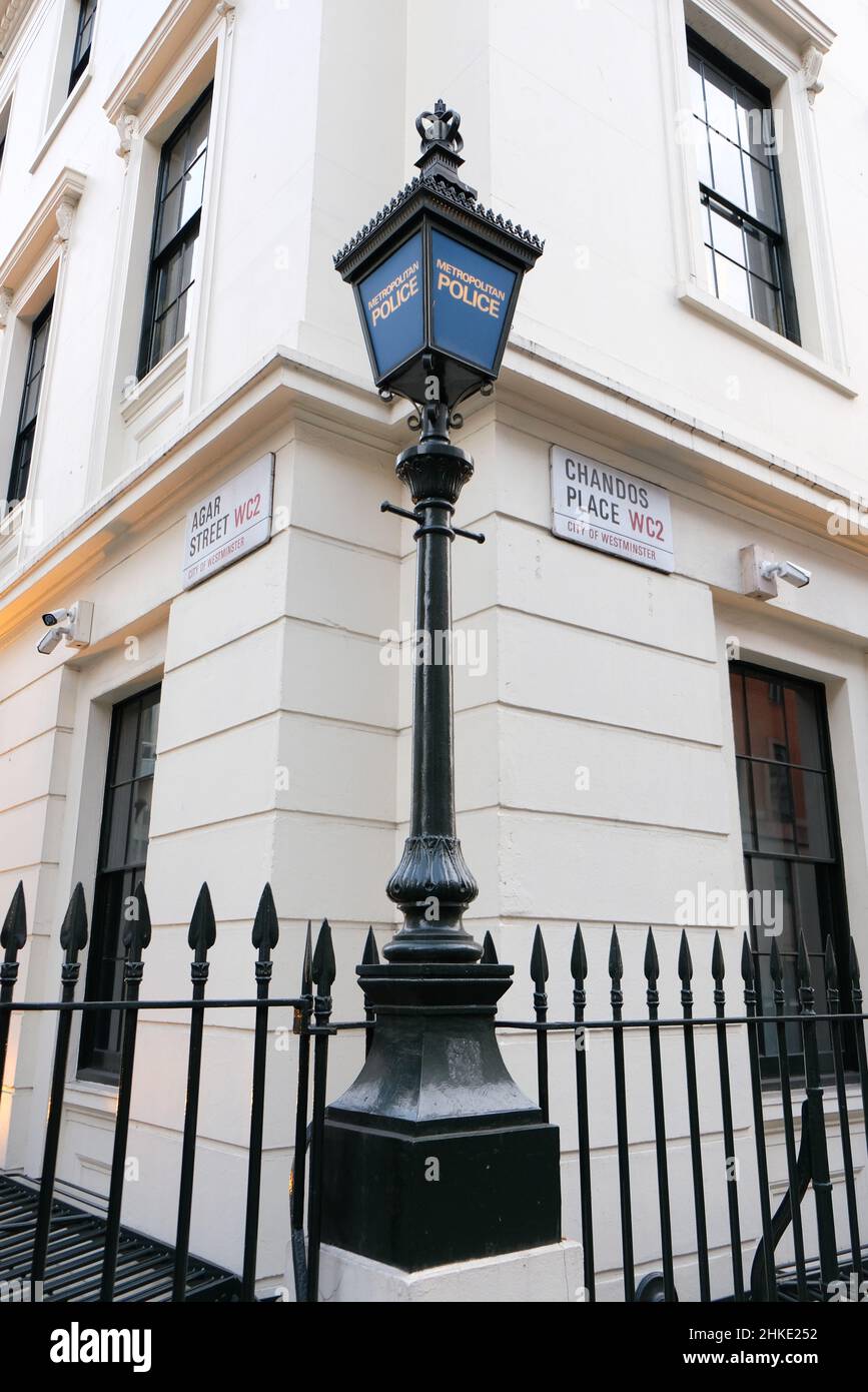 London, UK. A police station traditional blue lamp outside Charing ...