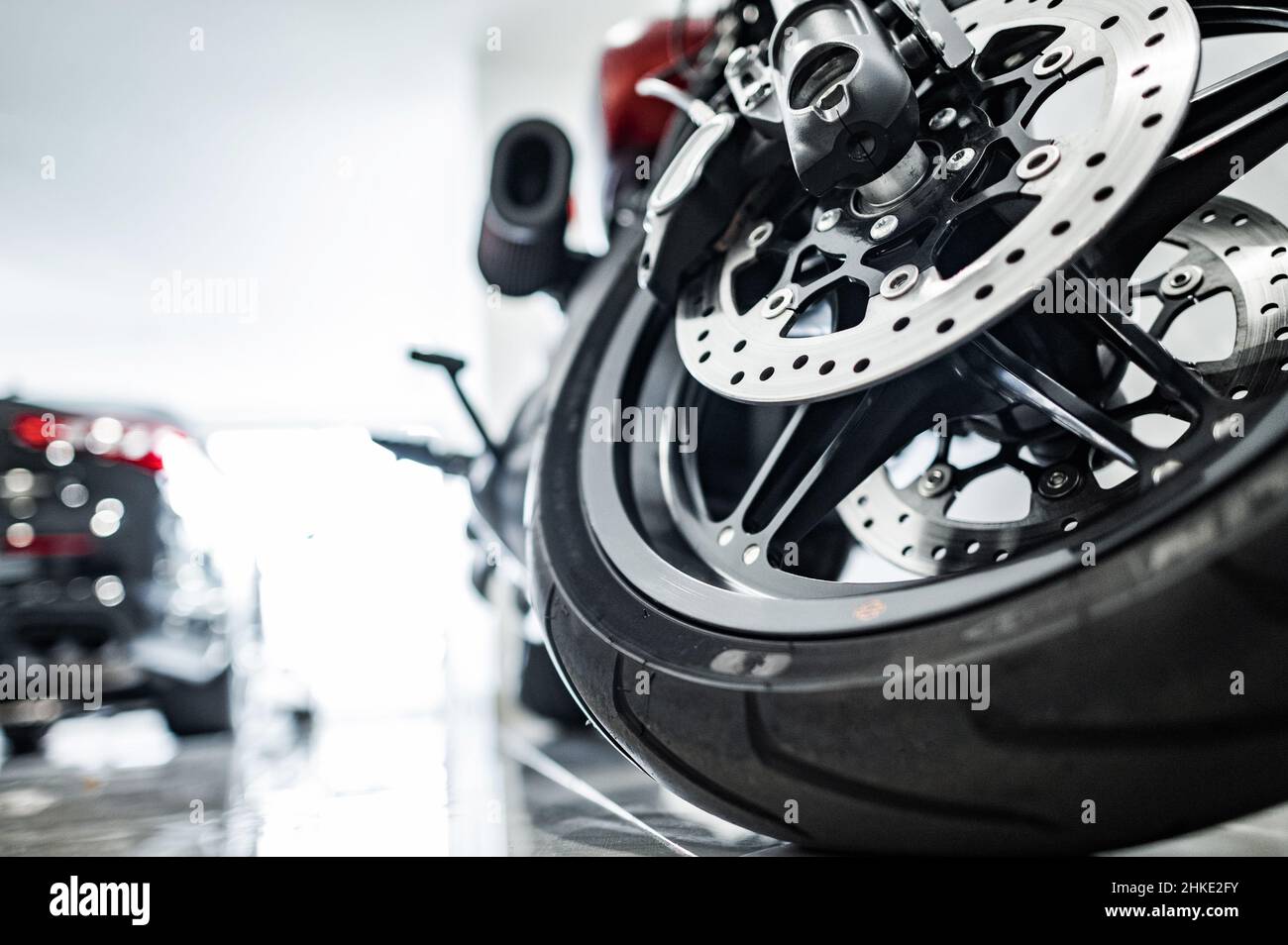 Modern Performance Motorcycle Inside Dealership Showroom. Front Wheel ...