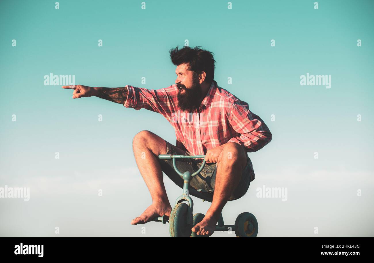 Crazy young man riding a small bike hi-res stock photography and images ...