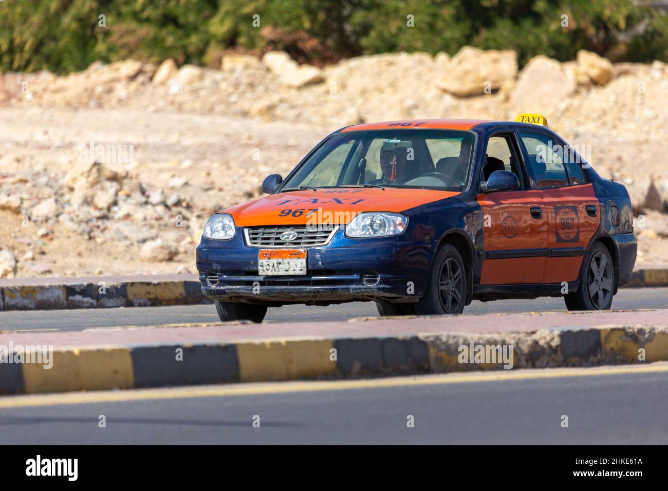 Hurghada, Egypt - January 30, 2022: Taxi cab drives on a street in ...