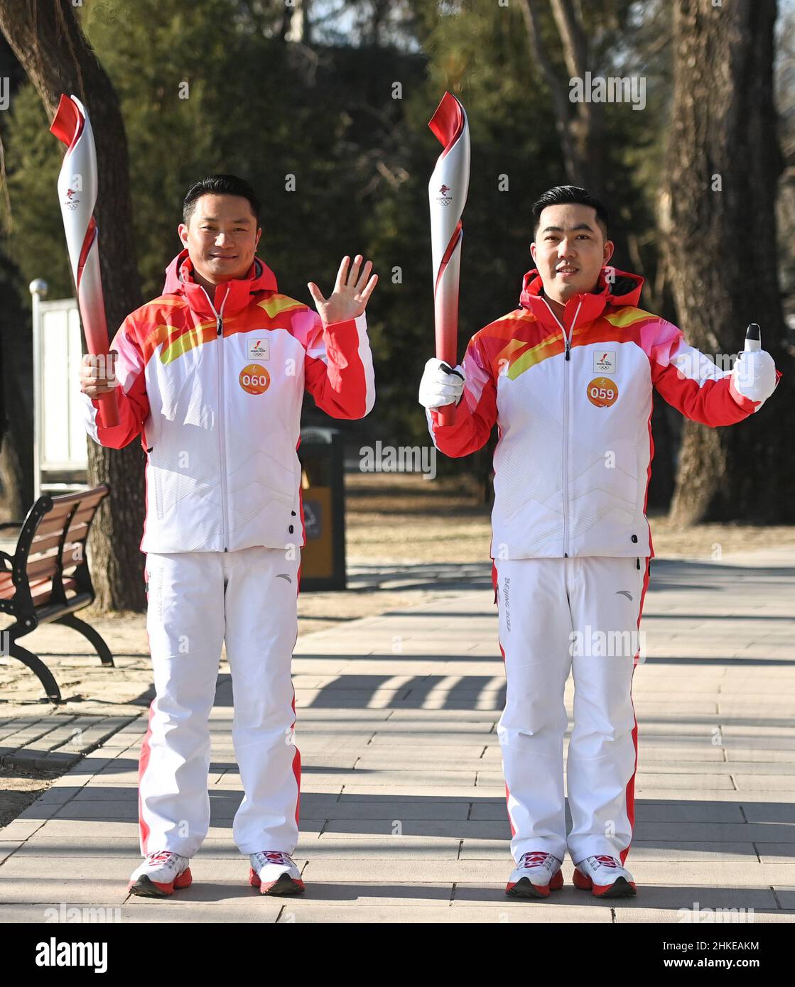 Beijing, China. 4th Feb, 2022. Torch bearers Yang Chun (L) and Liu ...