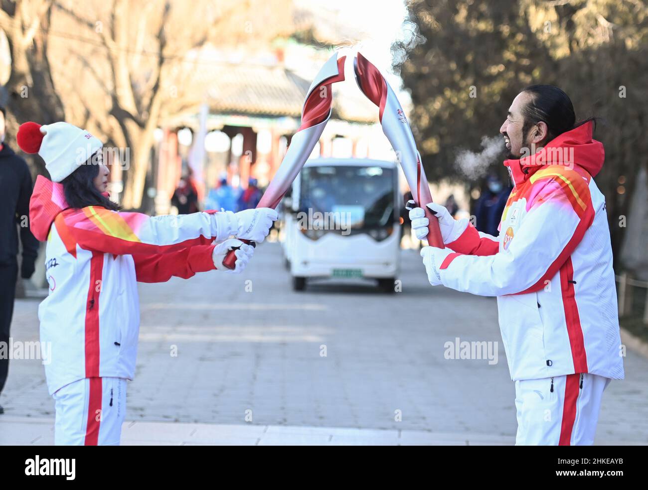 Beijing, China. 4th Feb, 2022. Torch bearers Lin Shiling (L) and Chimed ...