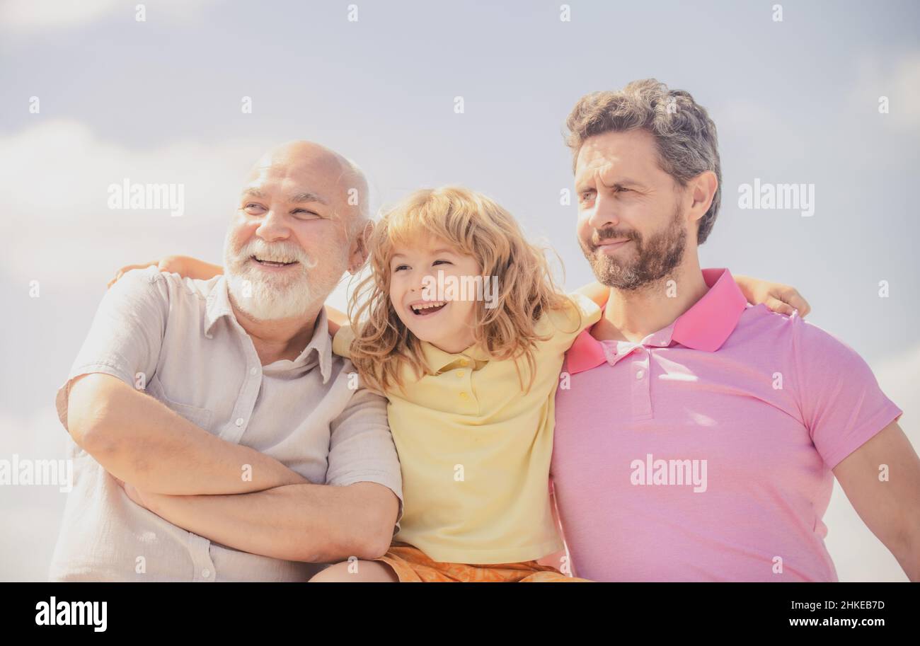 Men generation portrait of grandfather father and son child. Fathers ...