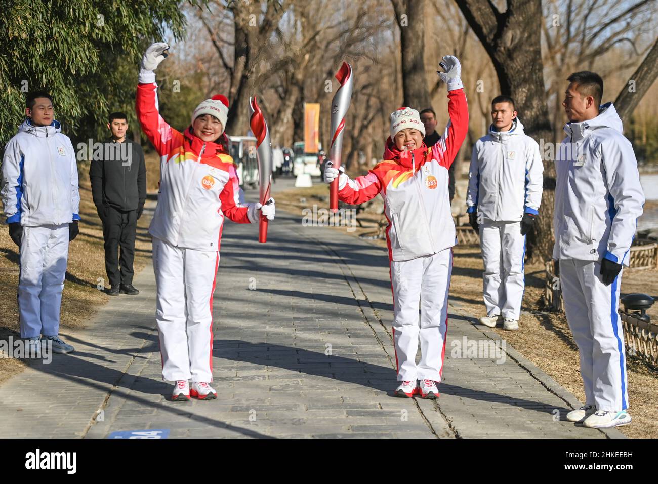 Beijing, China. 4th Feb, 2022. Torch bearers He Yang (L) and Tian ...