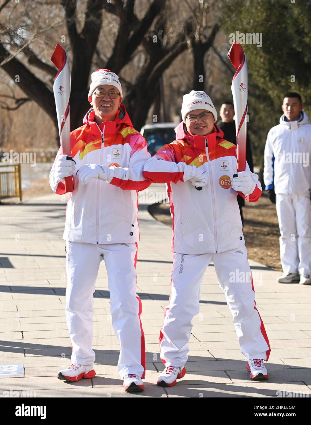Beijing, China. 4th Feb, 2022. Torch bearer Tang Xiongyan (L) and Wang ...
