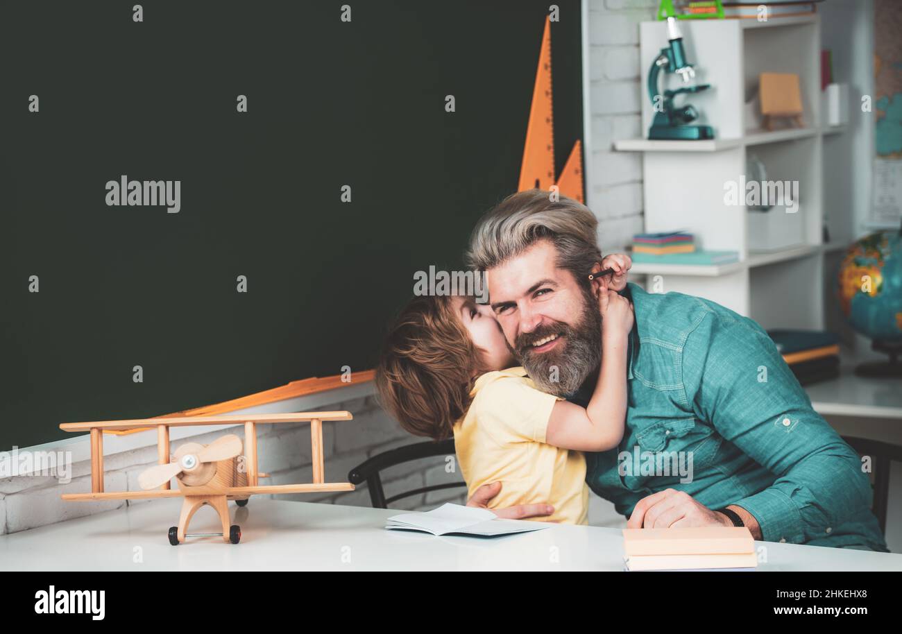 Elementary school tutorship. Afterschool tutoring. Happy school kids at ...