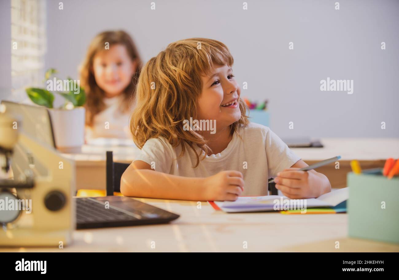 School kid doing homework. Pupil gets ready for school. Portrait of ...