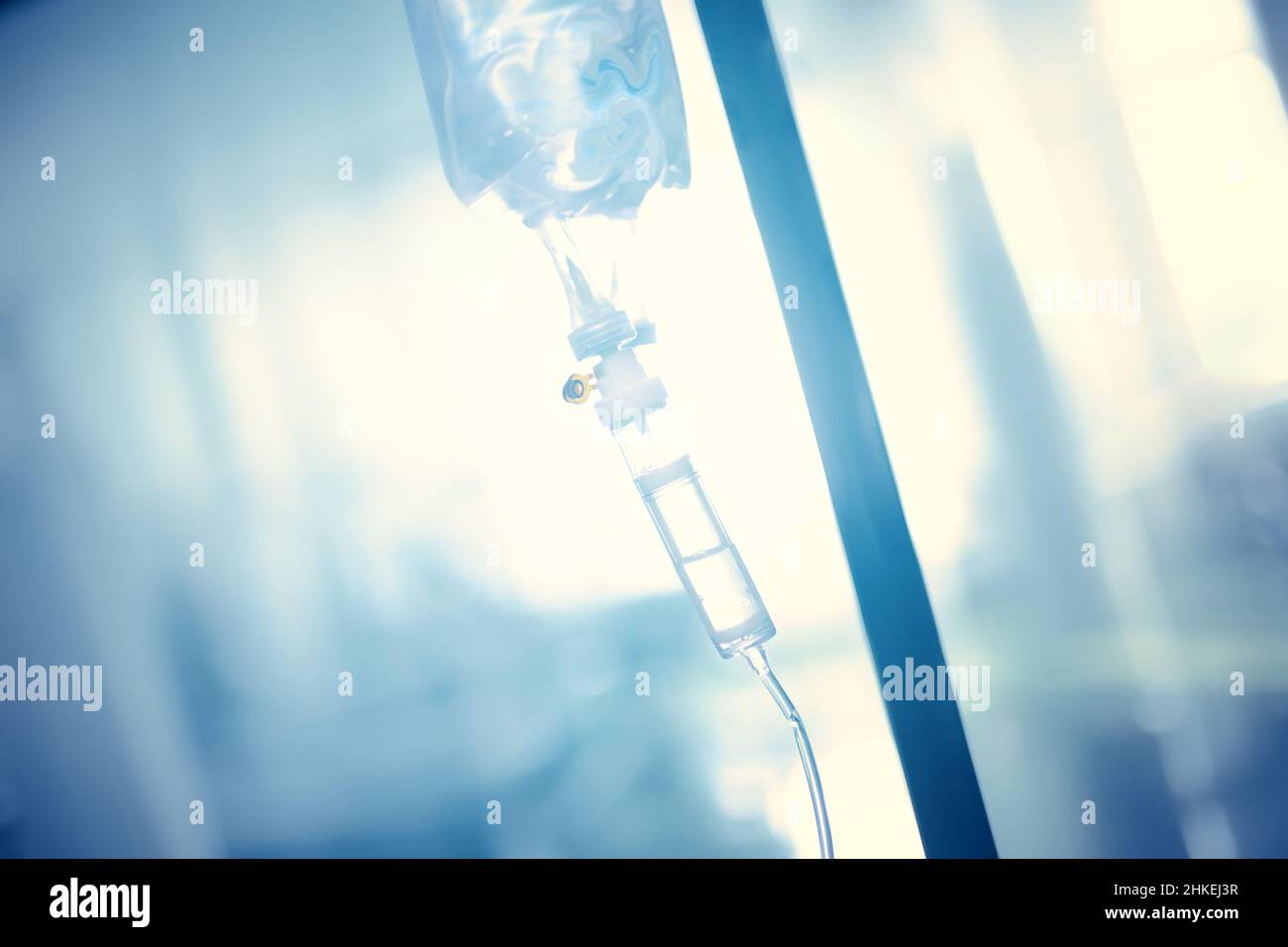 Intravenous drip against the bright light, as a concept of awakening to ...