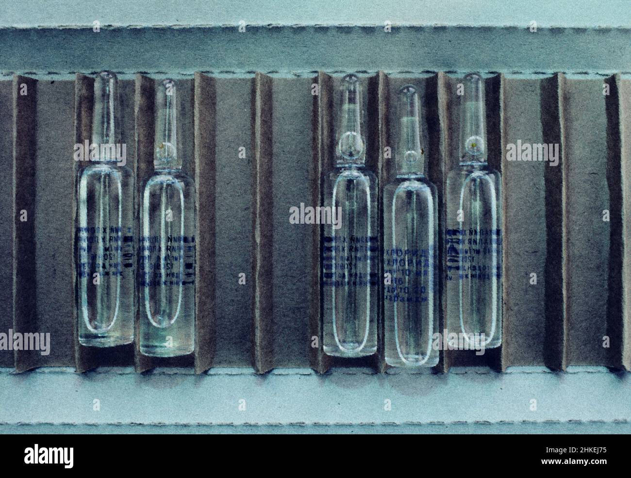 Open cardboard packing box with drug ampoules Stock Photo - Alamy