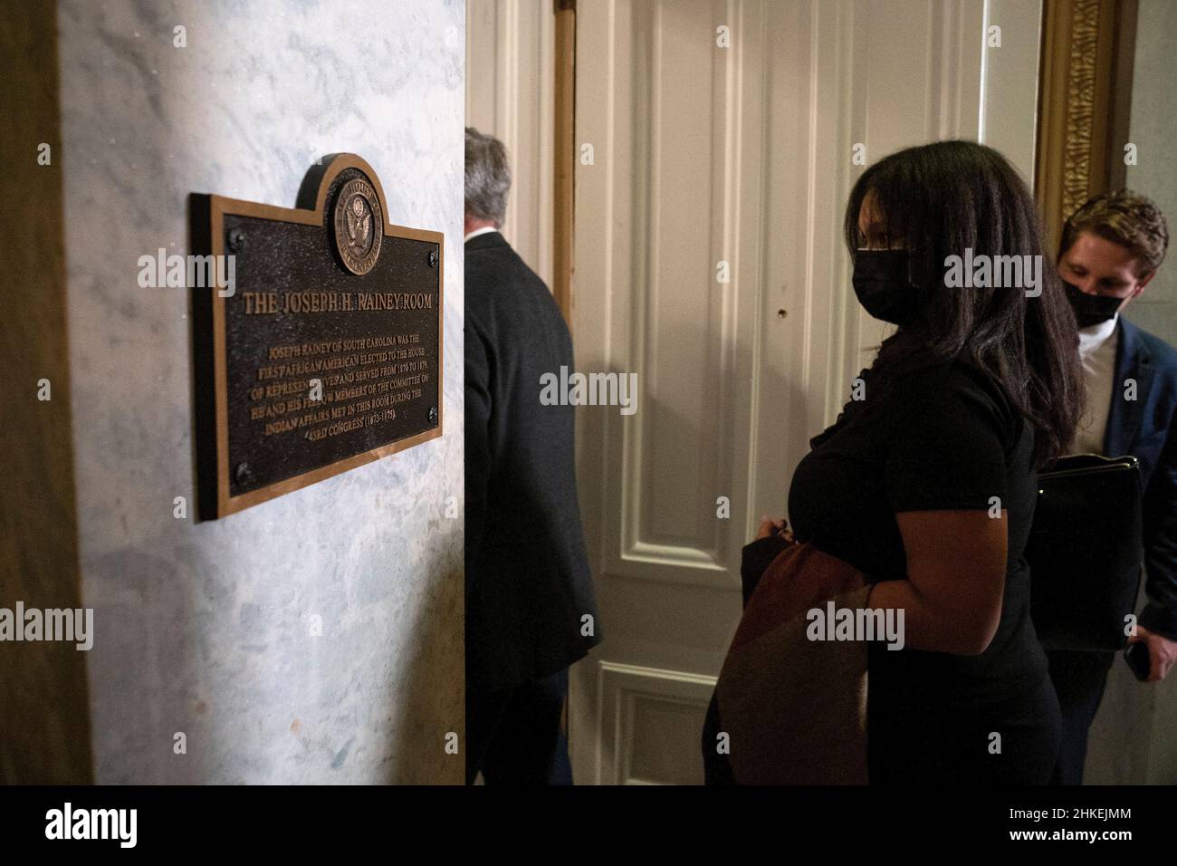 People enter the Joseph H. Rainey Room in the in the U.S. Capitol in ...