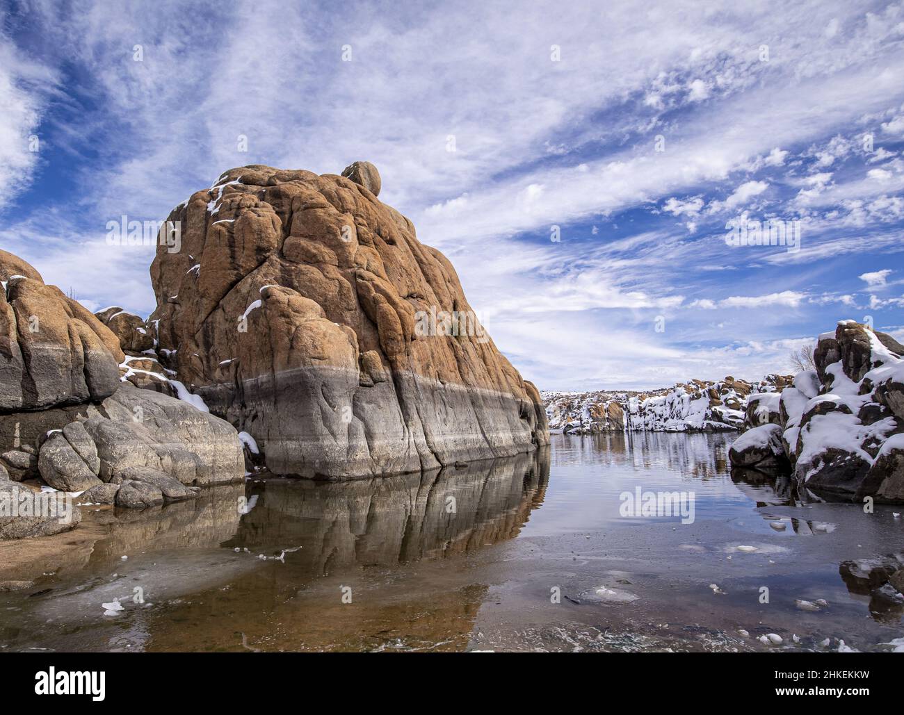 Boat launch view of the Watson Lake surrounded by boulder rocks in ...