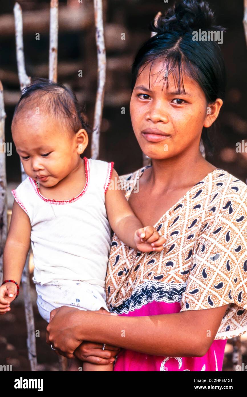 Philippine mother holding her baby, Manila, Philippines Stock Photo - Alamy