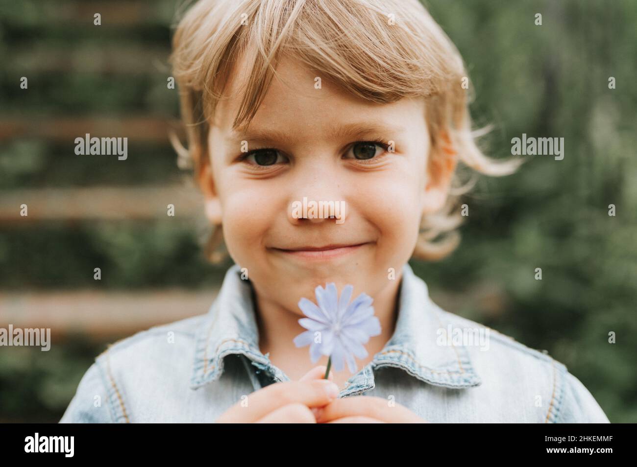 portrait of the face of a cute happy smiling little five year old ...