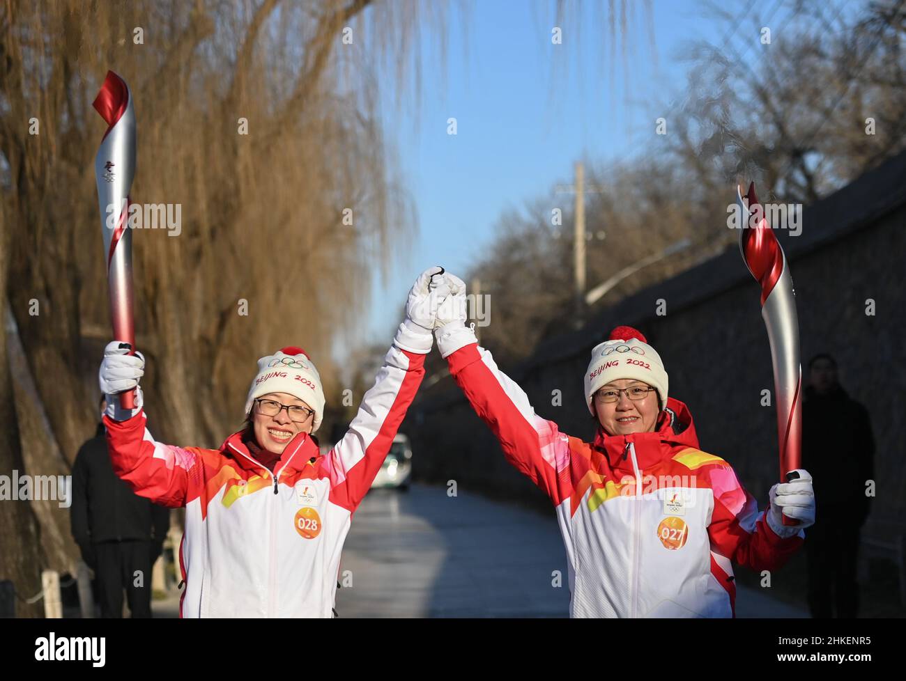 Beijing, China. 4th Feb, 2022. Torch bearers Song Dan (L) and Ye Yanlin ...
