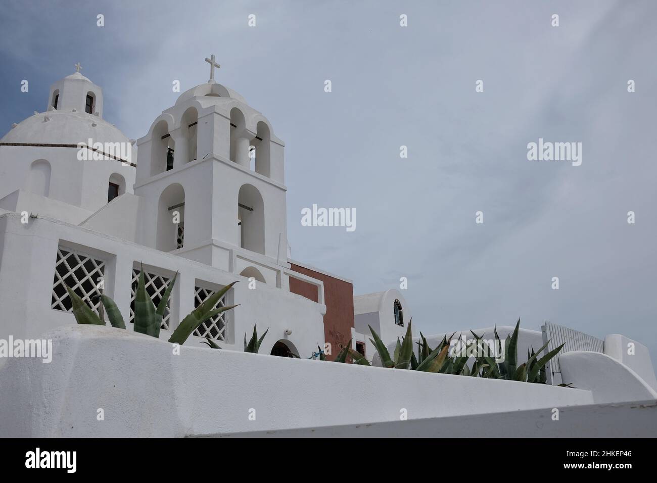 View of two orthodox Greek chapels in Fira Santorini Greece Stock Photo ...