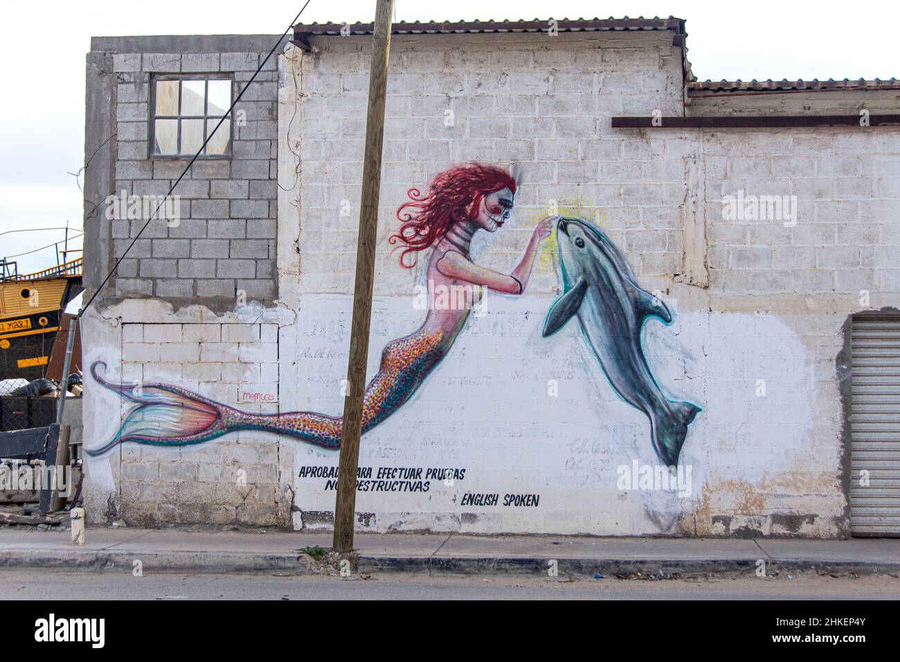 A community/public mural of a mermaid feeding a fish. Puerto Penasco ...