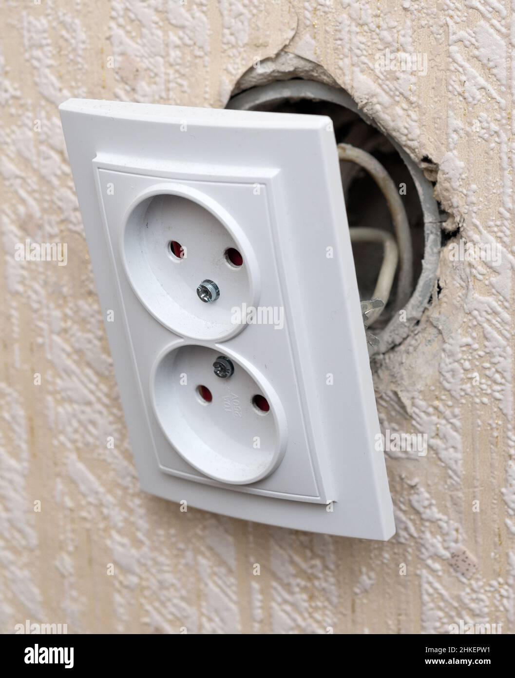 Broken electricity socket hi-res stock photography and images - Alamy