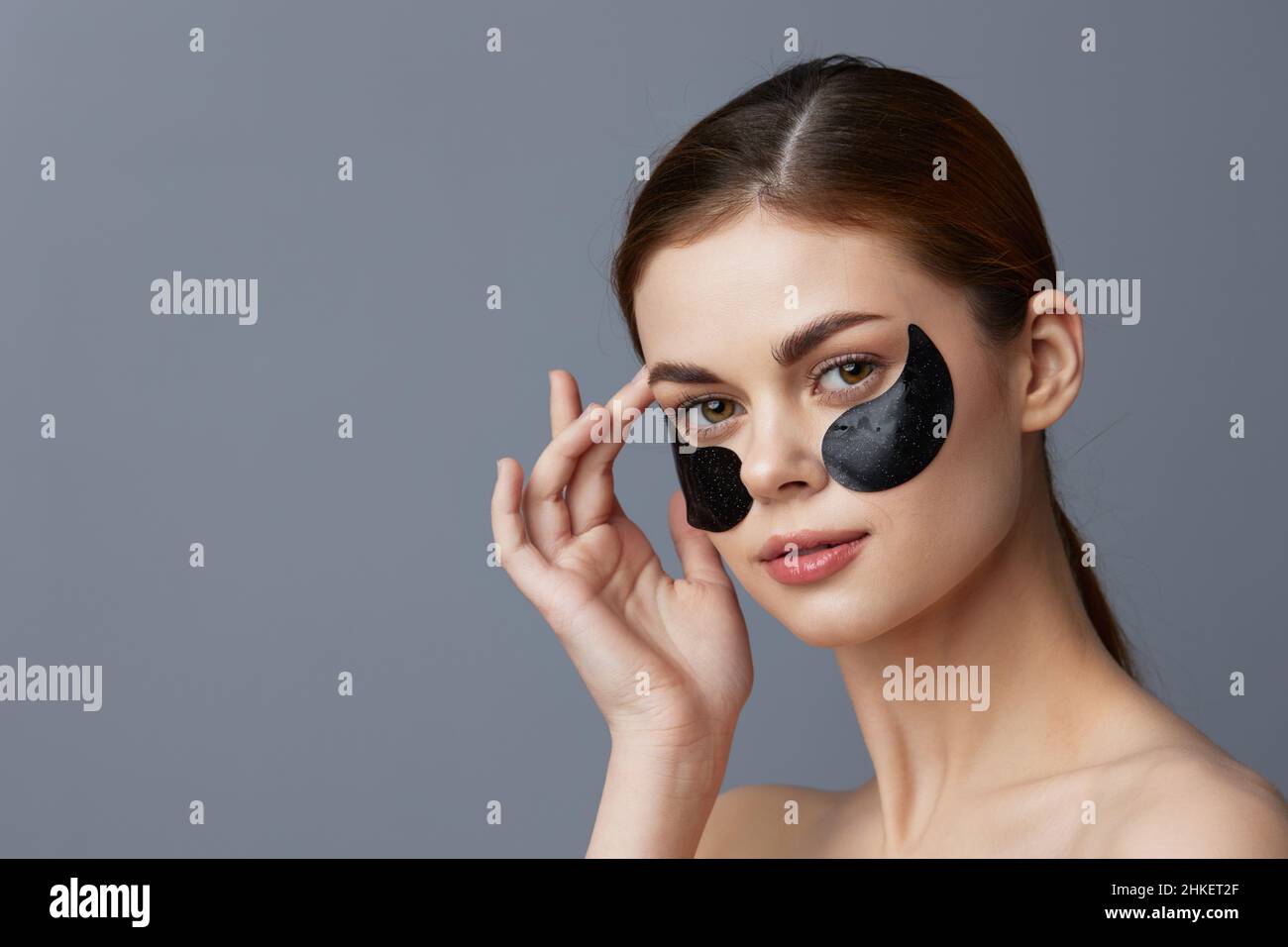 beautiful woman with patches on the face clean skin health rejuvenation ...